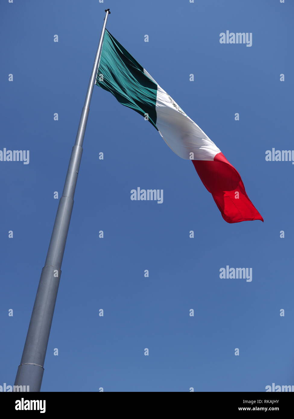 Beautiful national maxican flag on beach at bay of Pacific Ocean in ...