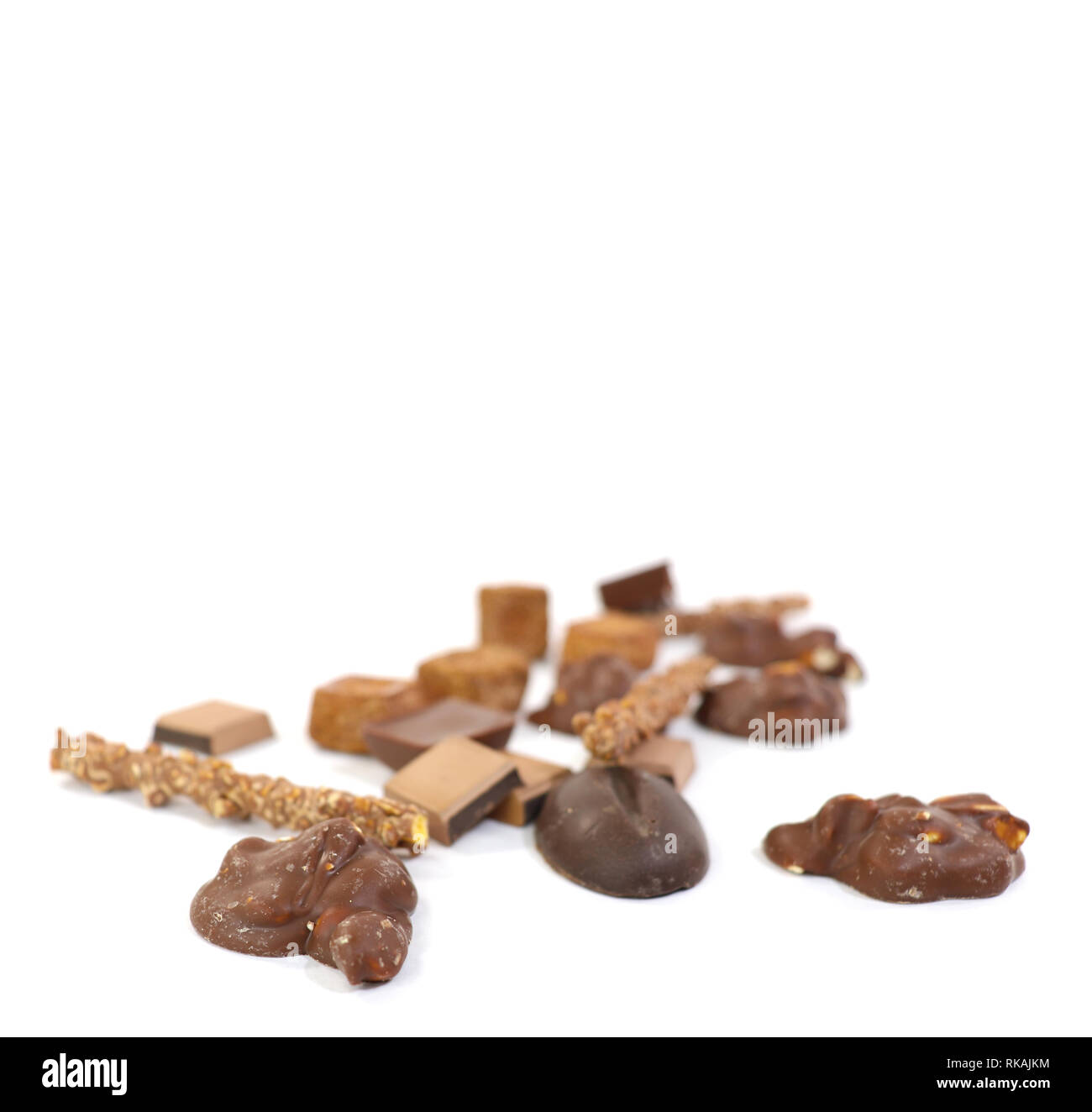 Assorted handmade chocolates on white background Stock Photo - Alamy