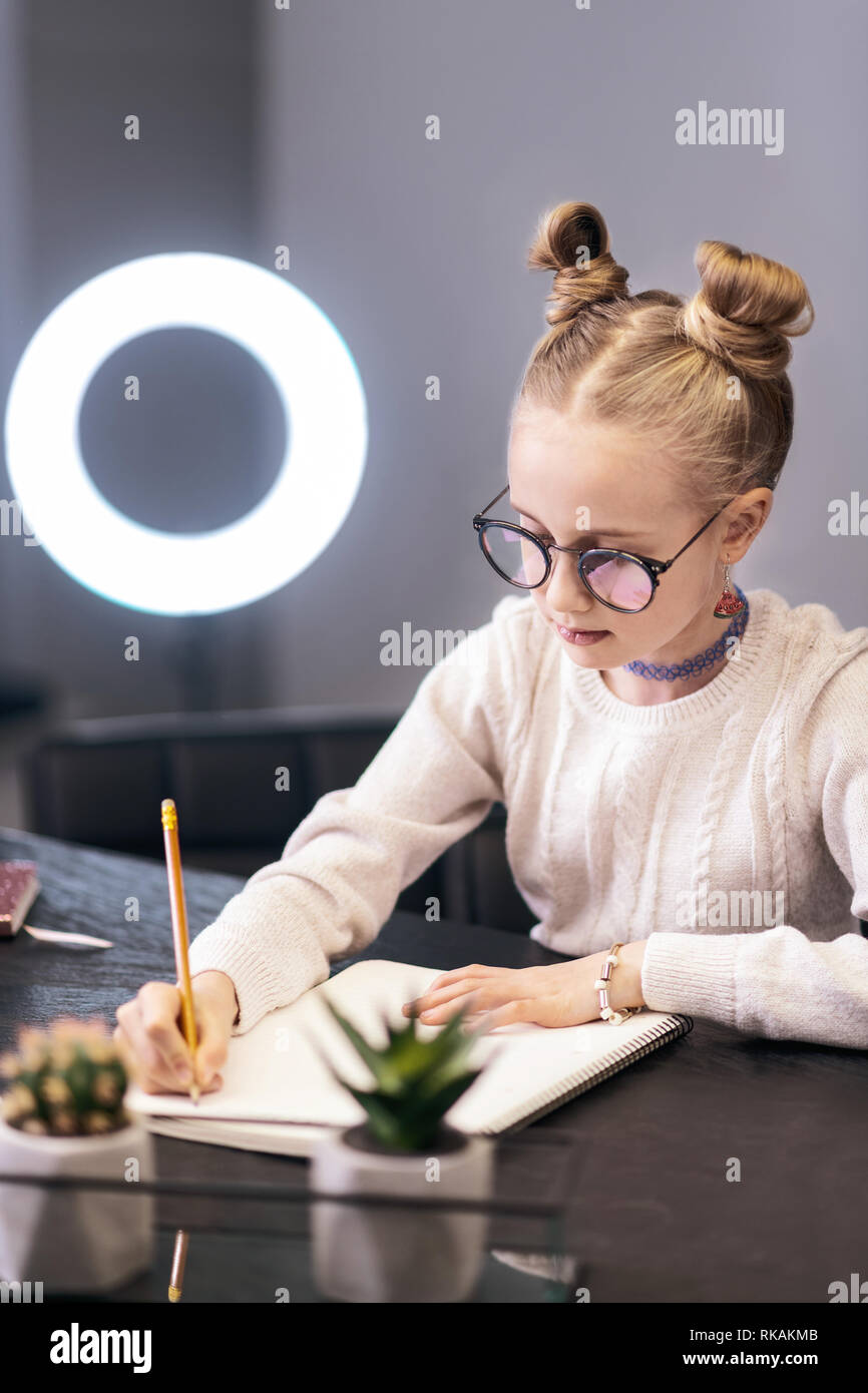 Girl looking table letters hi-res stock photography and images - Alamy