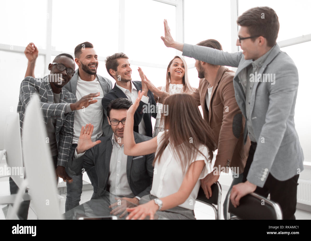 Ambitious business team celebrating success in the office.concept of ...