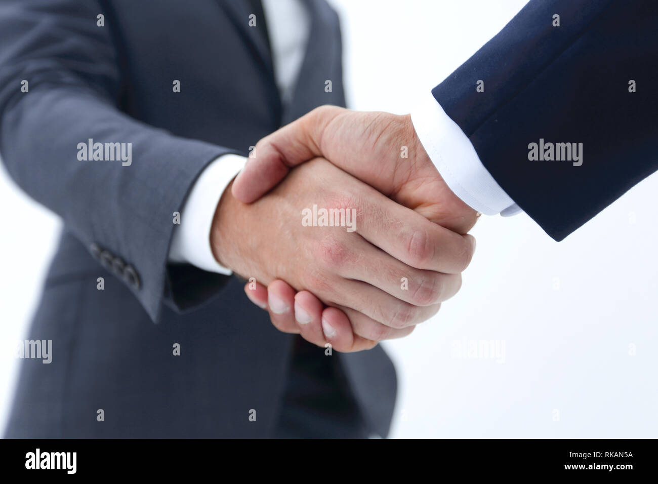 The conclusion of the transaction. Handshake Stock Photo - Alamy