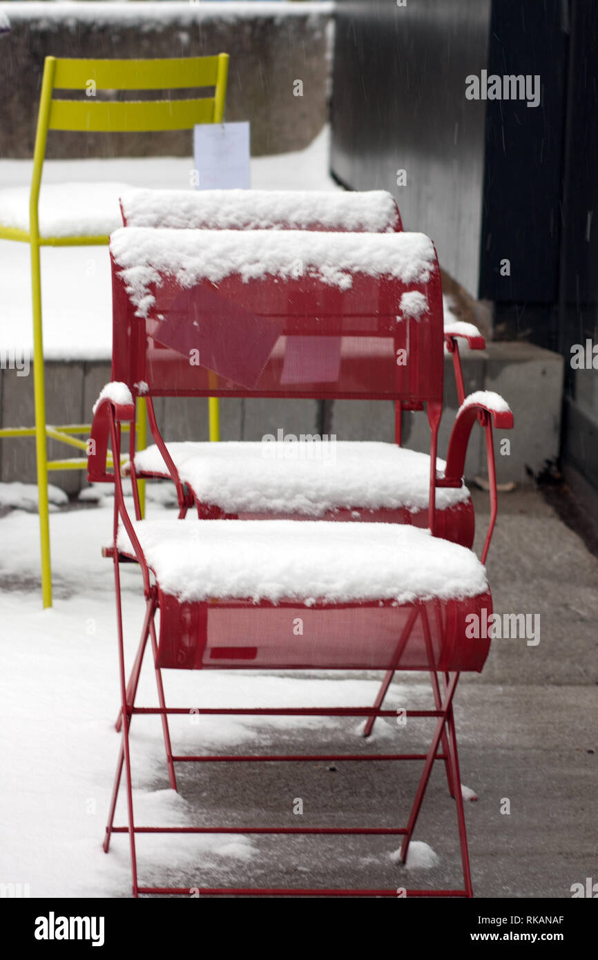 snow covered chairs Stock Photo - Alamy