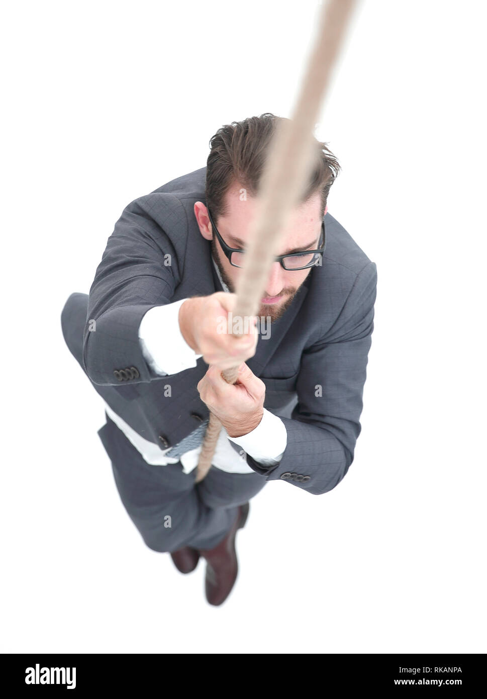 top view .a successful businessman climbing the rope.photo with copy ...