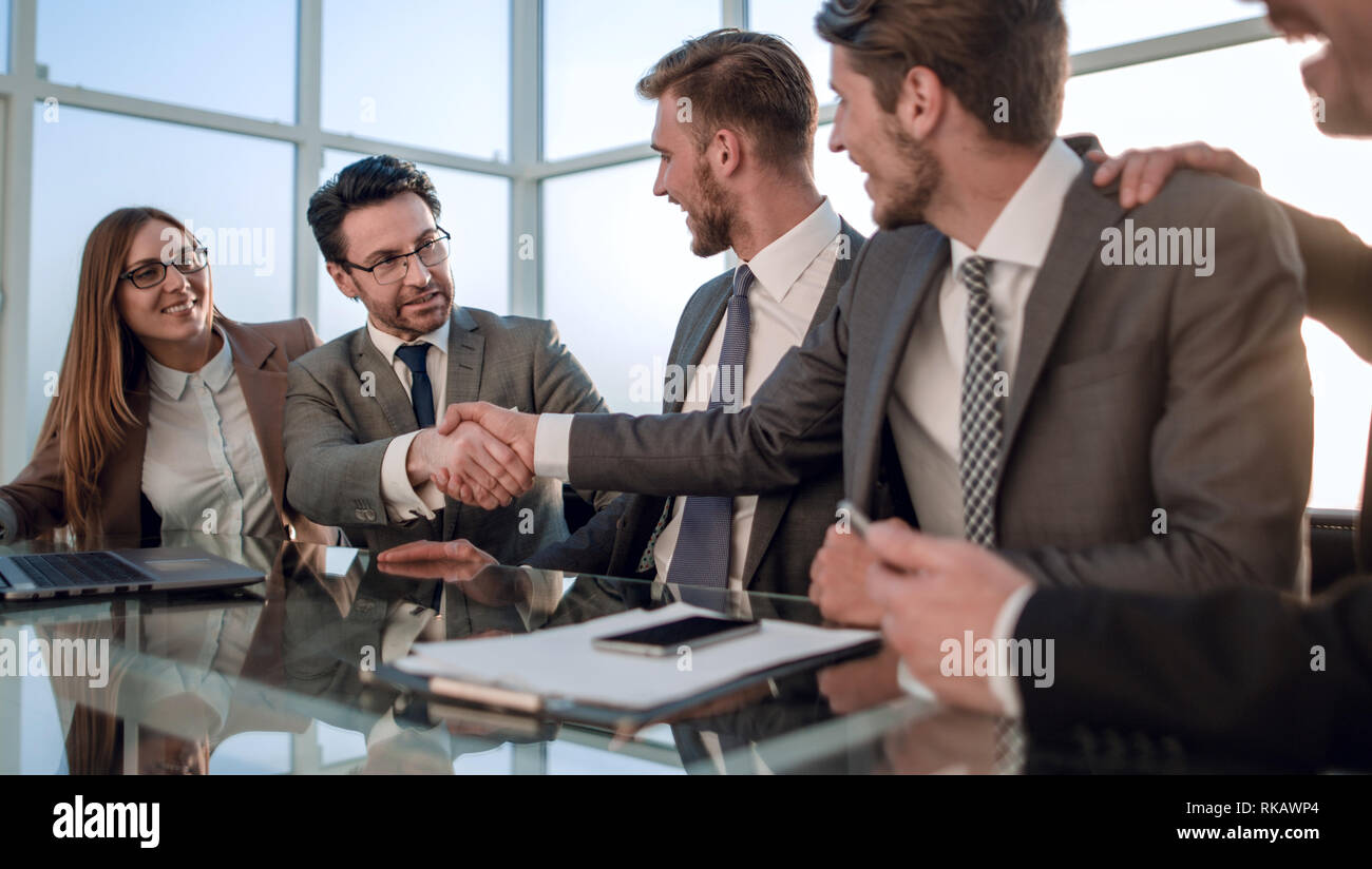 stock traders analyzing market, pointing at charts on monitor Stock ...