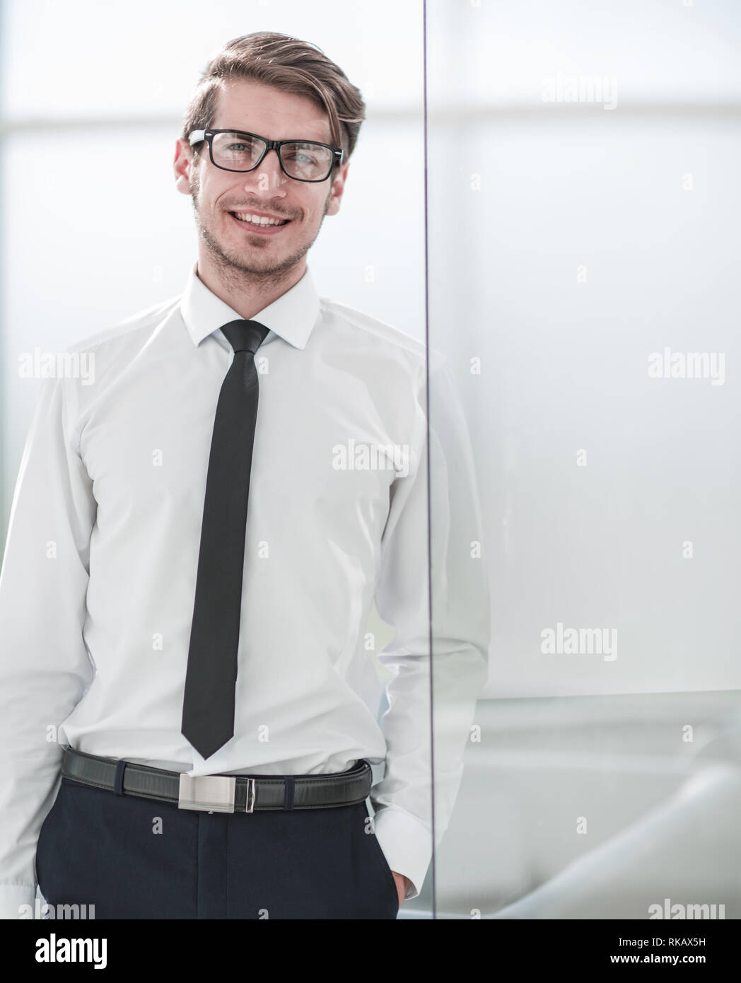 close up.young employee standing in the office.business people Stock ...