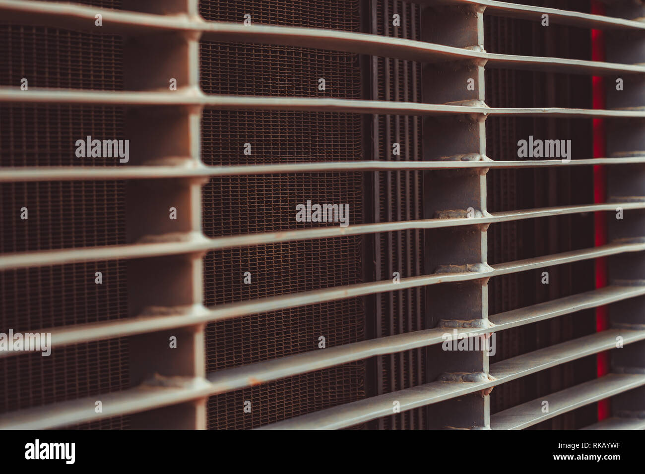 yellow front Grille of the new farm tractor Stock Photo - Alamy