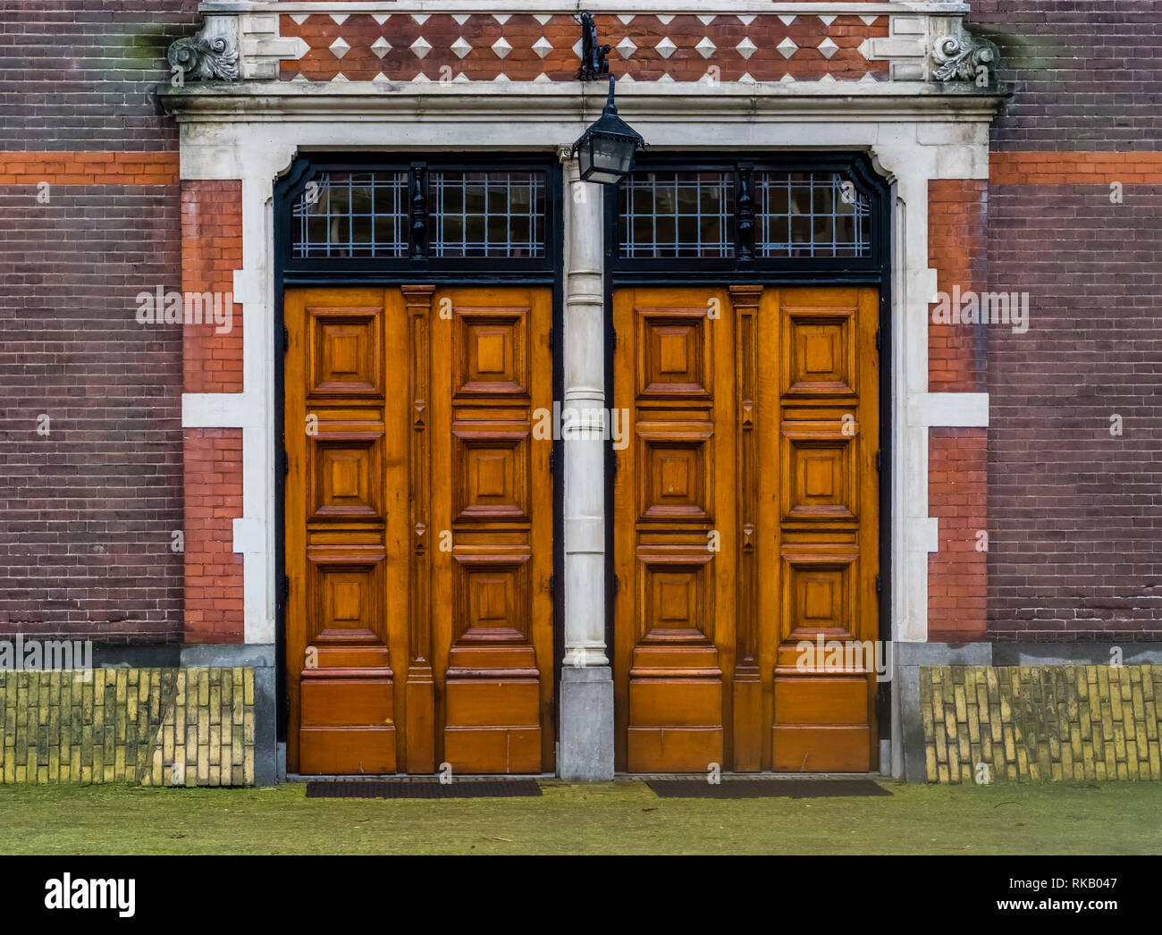two massive wooden doors with a lantern, Modern architecture, entrance ...