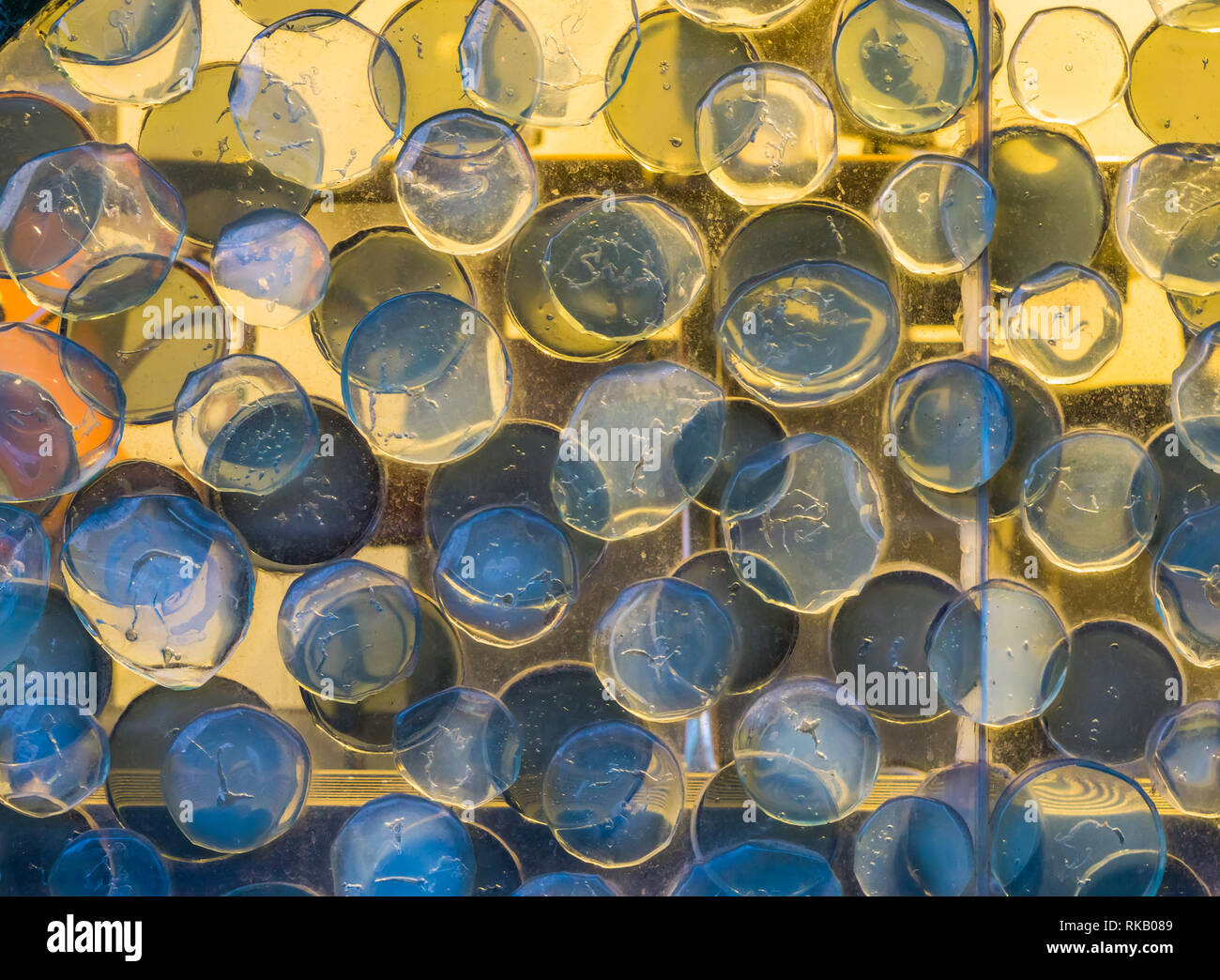 macro closeup of a beautiful glass art work, round circle shapes ...