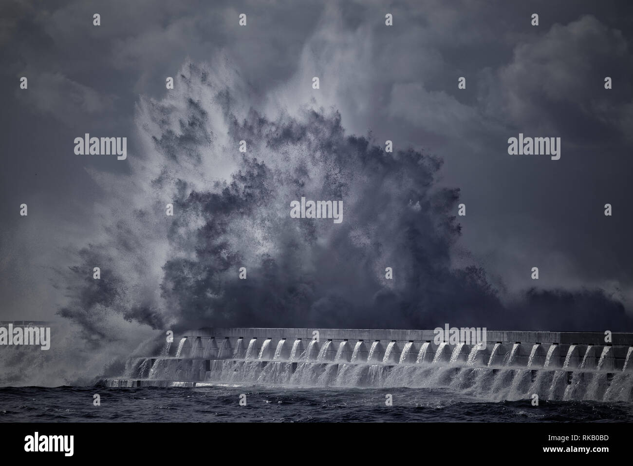 Big wave splash, toned blue Stock Photo - Alamy