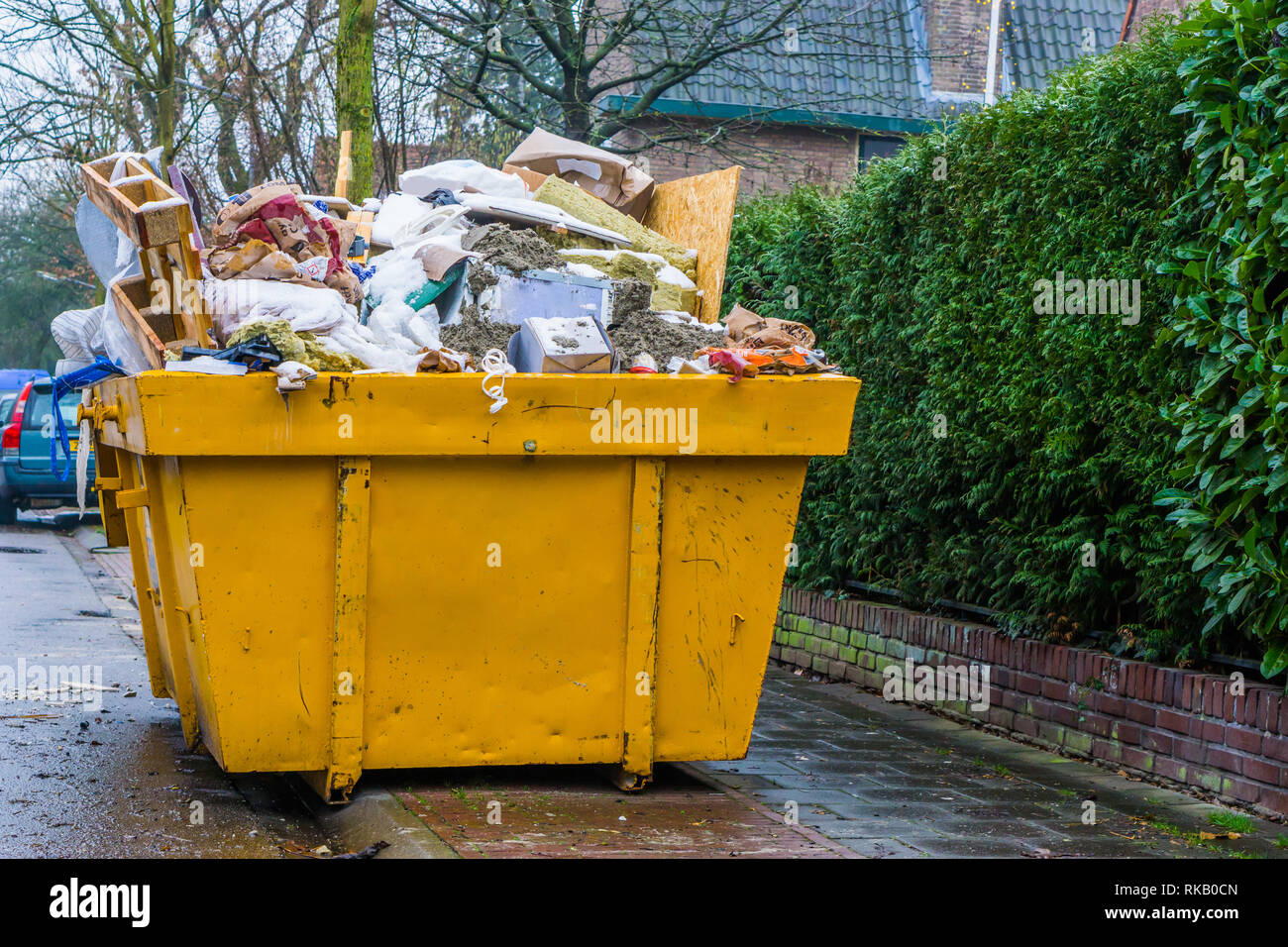 massive container full of bulky waste, pile of garbage, recycling ...