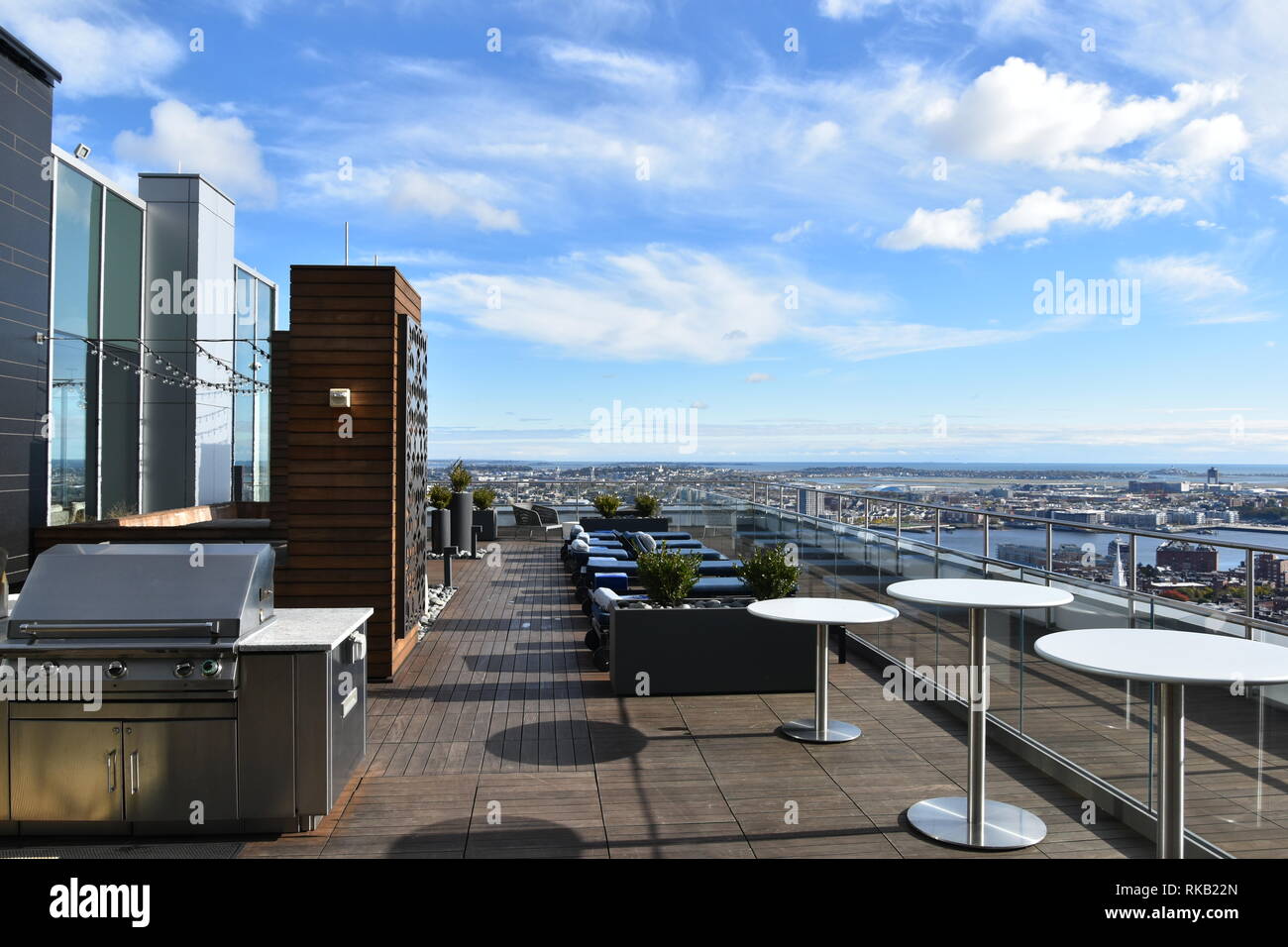 View of the Boston skyline seen from the Avalon North Station roof deck ...