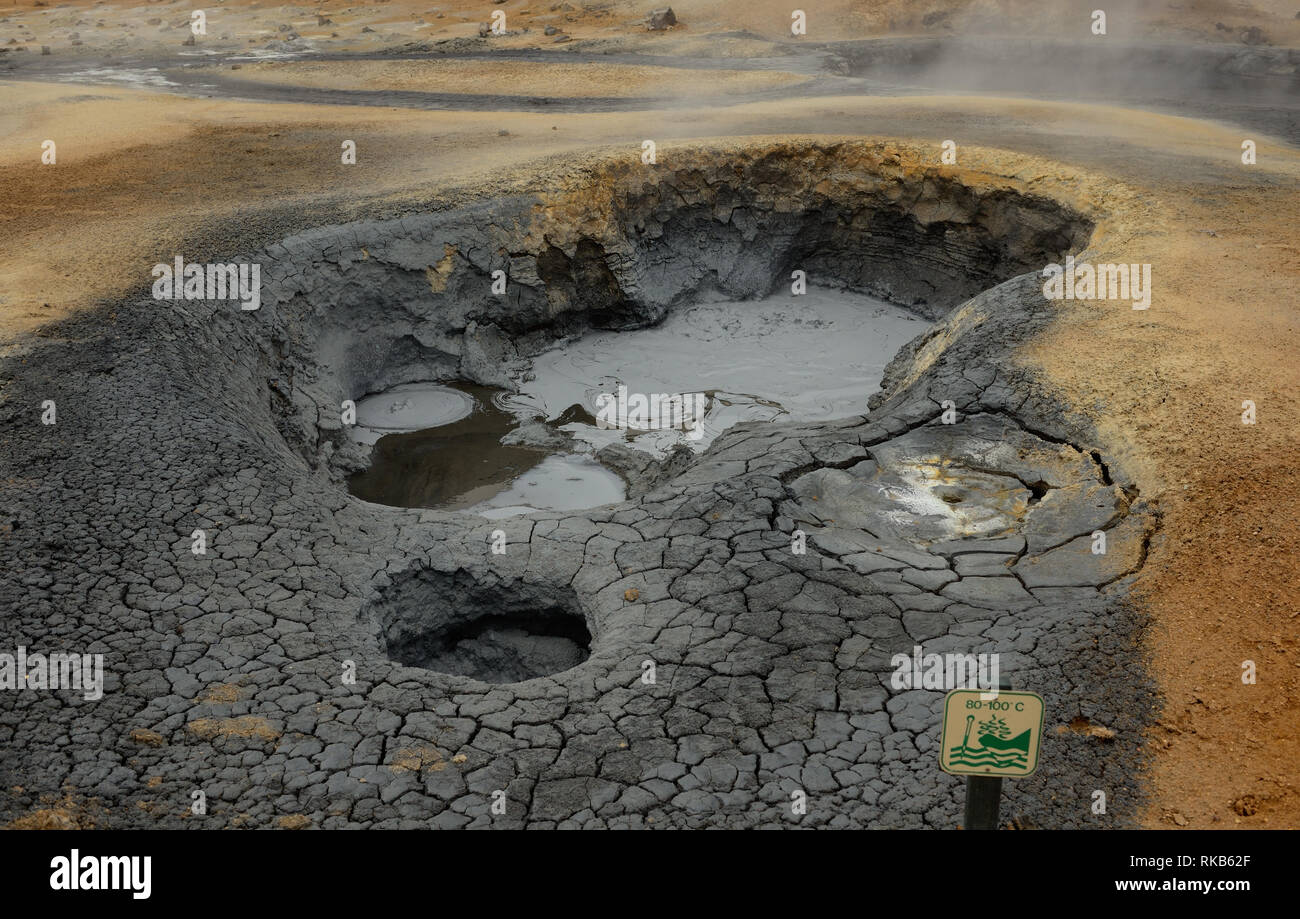 Boiling mud pots at Namafjall, a popular tourist spot in Iceland Stock ...