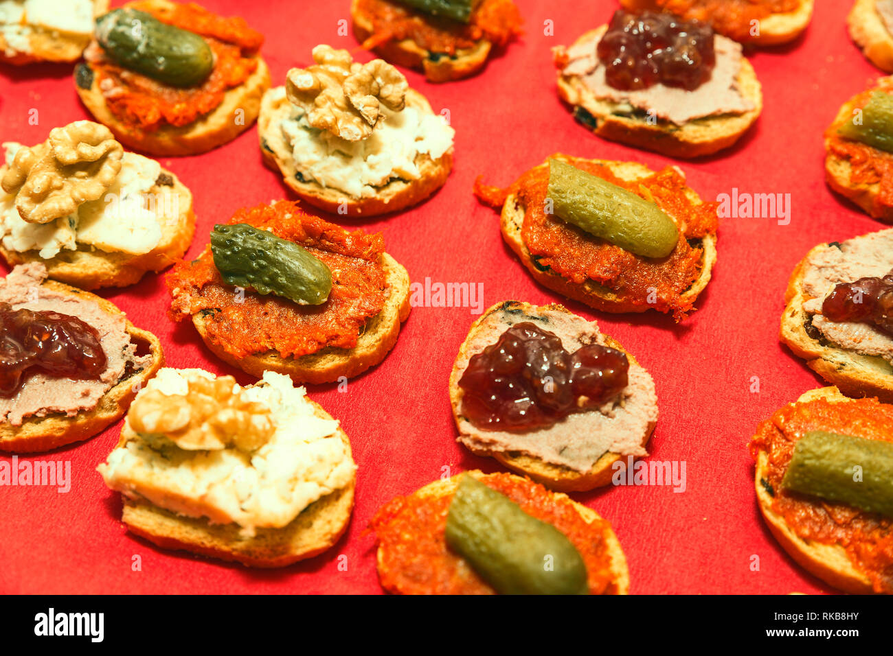 top view of little canapes on red tablecloth Stock Photo - Alamy