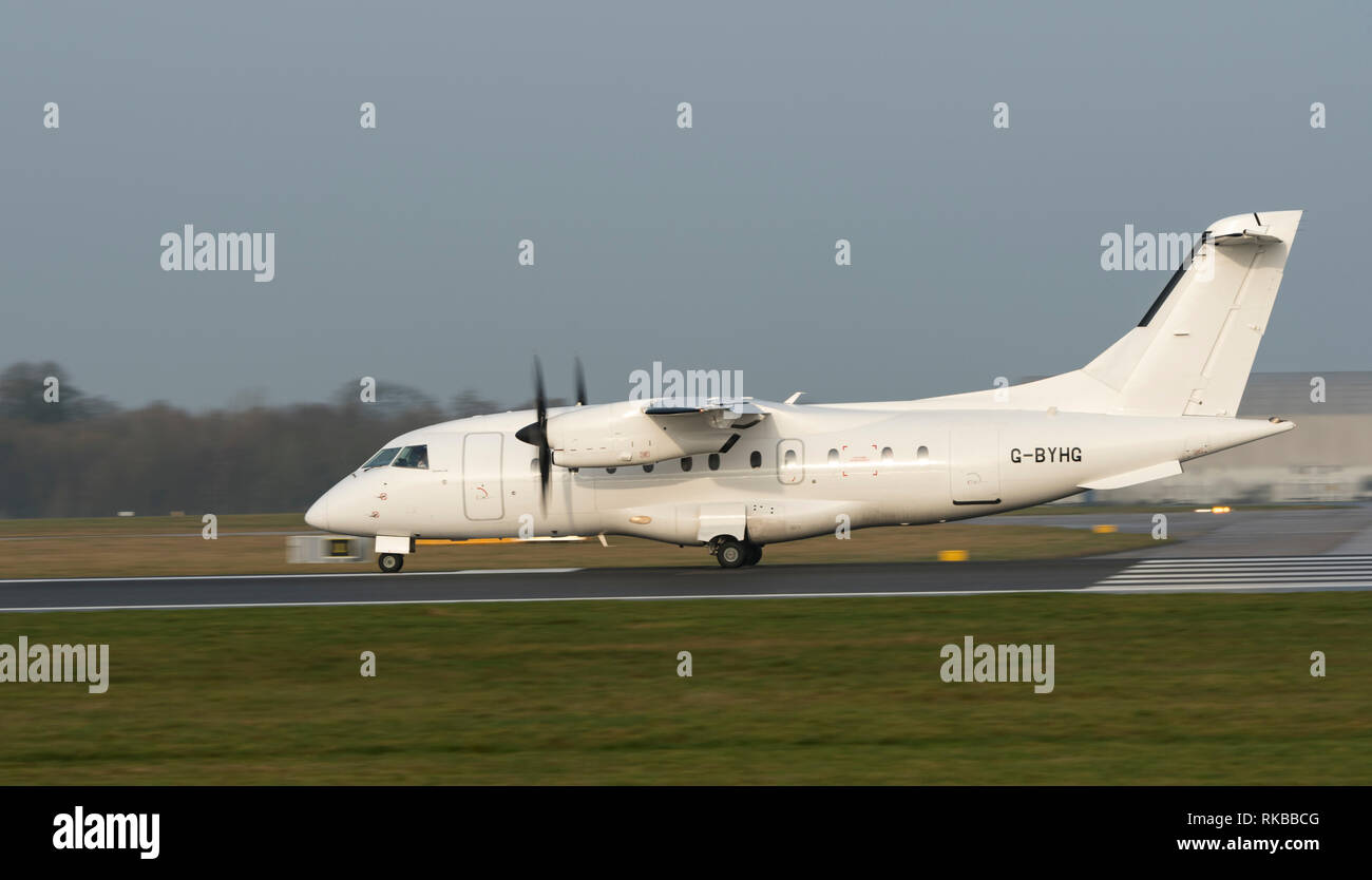 Loganair, Dornier 328-110, G-BYHG at Manchester Airport taxying for ...