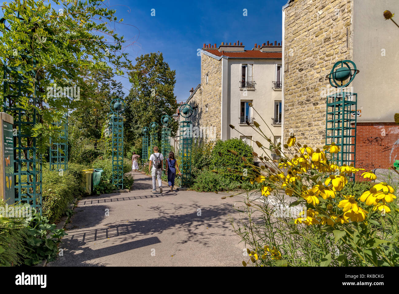 People walking along Promenade Plantée a mid-19th century viaduct ...