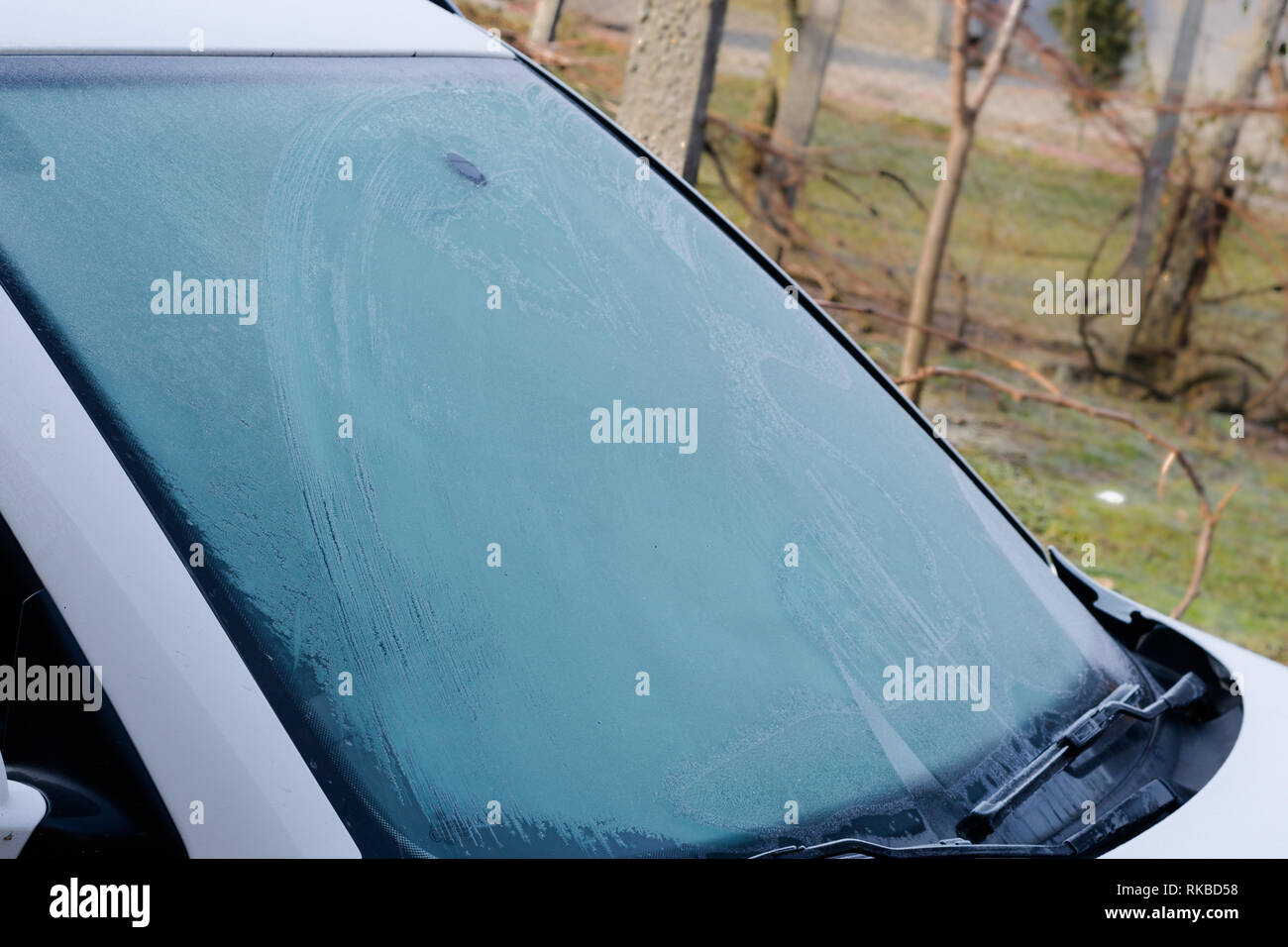 a frozen windscreen of a car one morning Stock Photo - Alamy