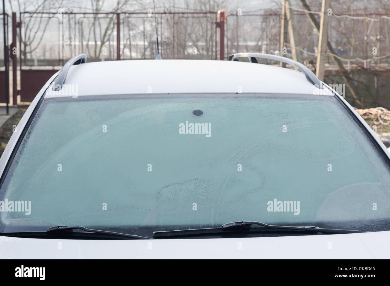 a frozen windscreen of a car one morning Stock Photo - Alamy