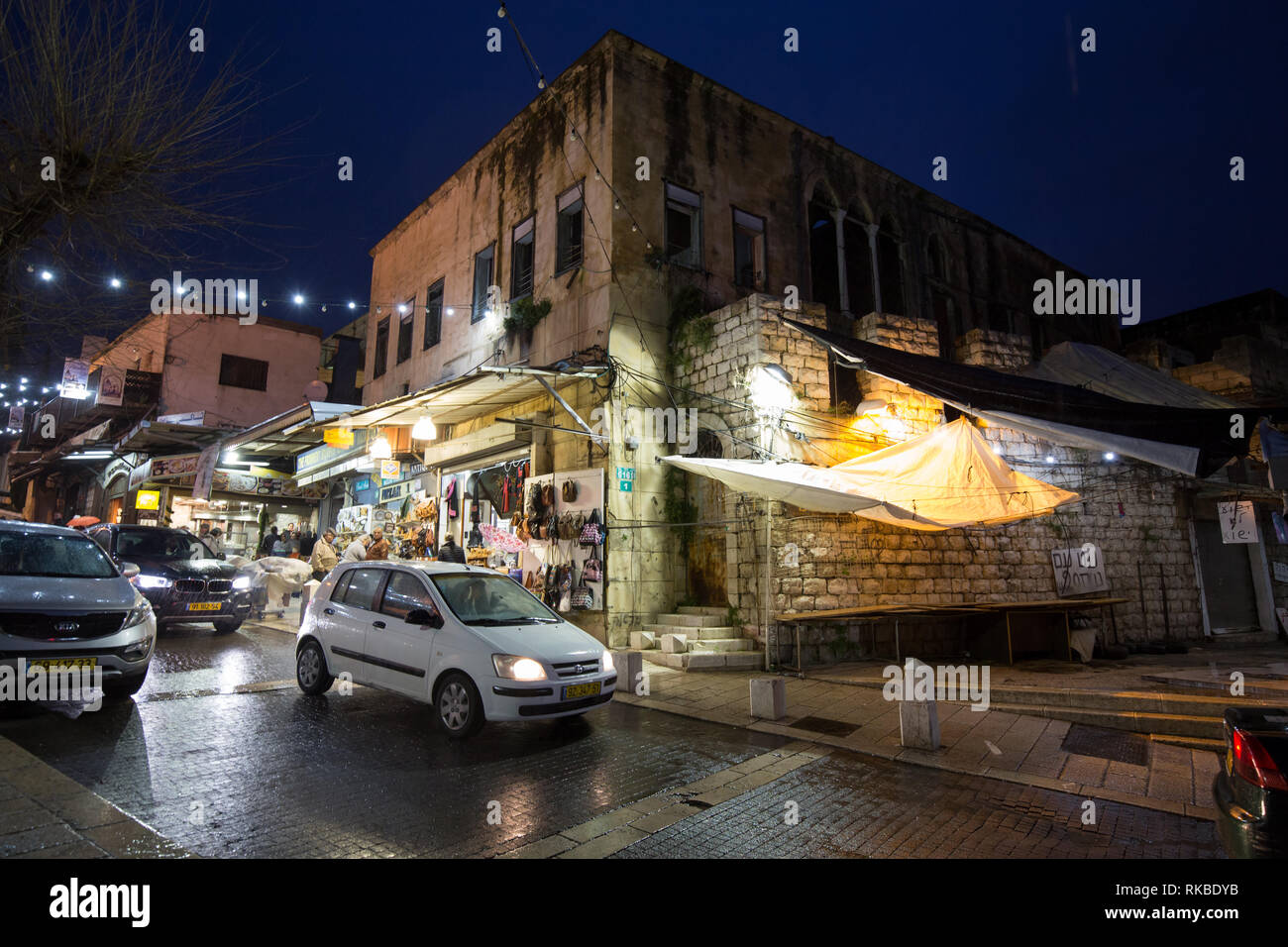 Small shops in the Streets of Nazareth late at night Stock Photo - Alamy