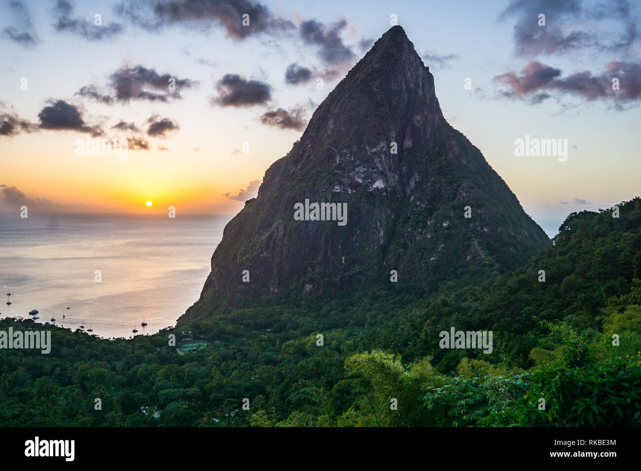Sunset view of the pitons from the ridge just before sunset Stock Photo ...