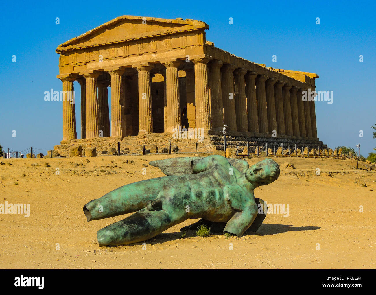 Agrigento statue os hercules toppled in front of temple Stock Photo - Alamy