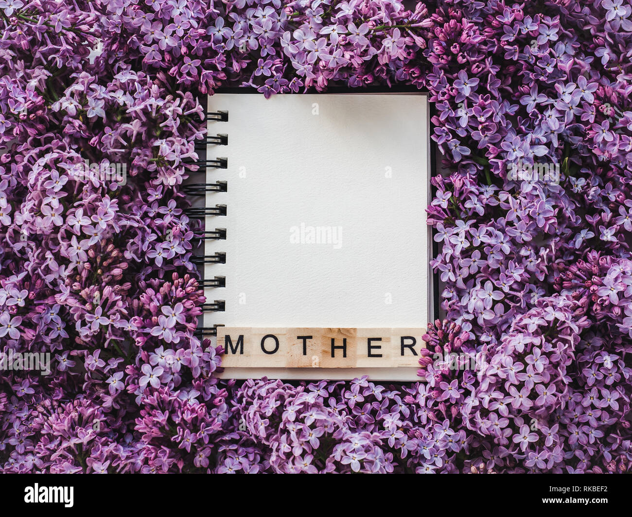 Beautiful greeting card with the word MOTHER Stock Photo - Alamy