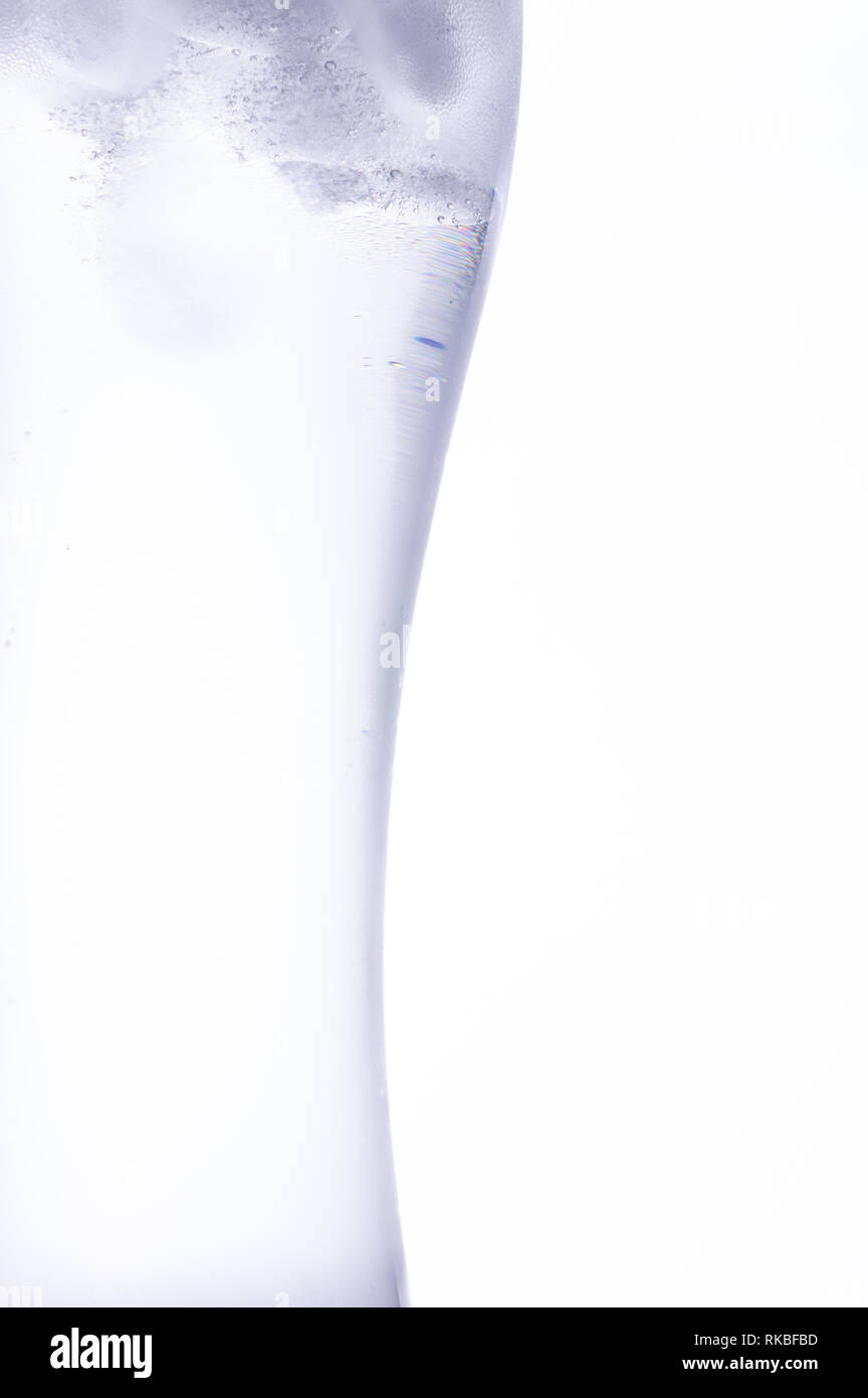 water with ice cubes in glass. white background Stock Photo - Alamy