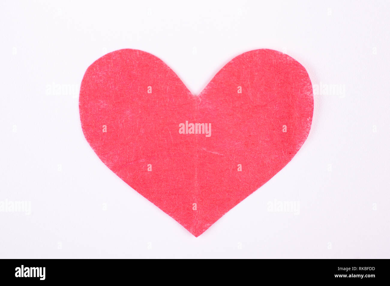 Heart made of colored paper on white background Stock Photo - Alamy