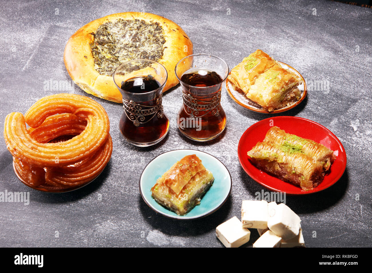 Middle eastern or arabic dishes and assorted meze, concrete rustic ...