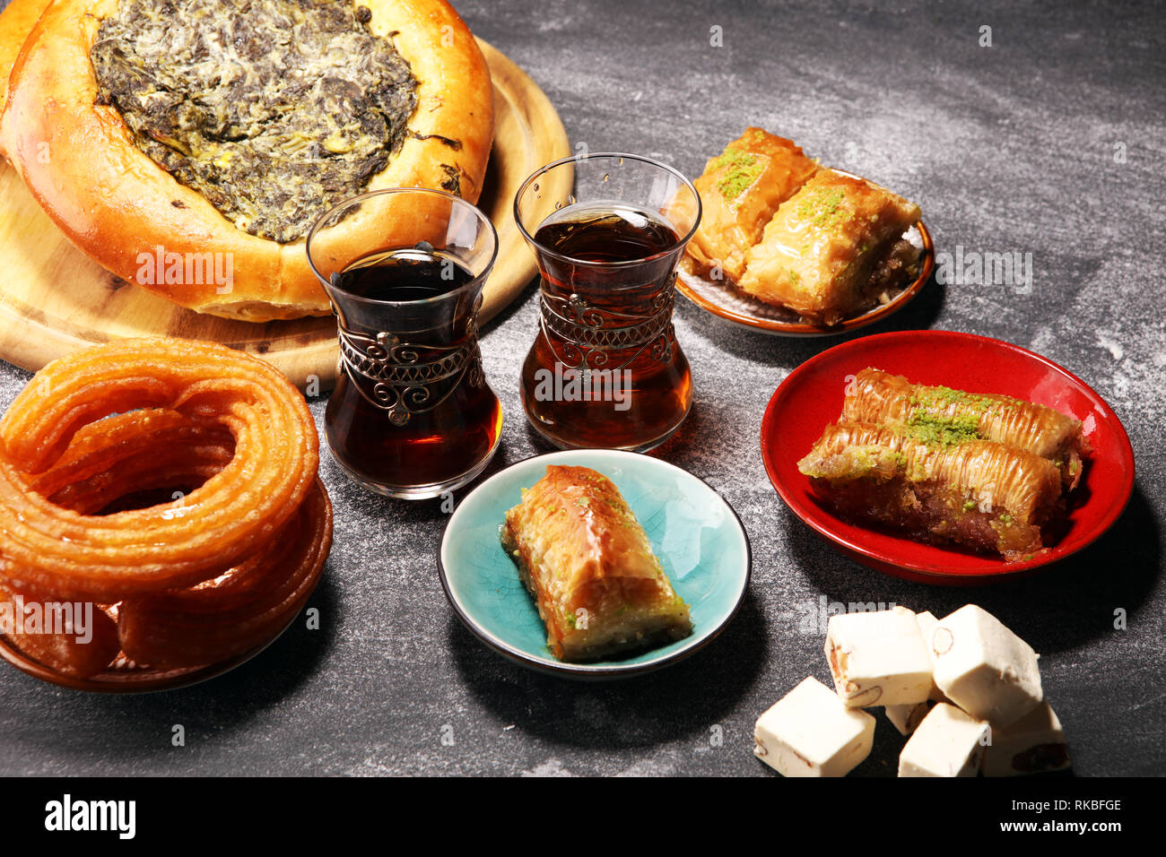 Middle eastern or arabic dishes and assorted meze, concrete rustic ...