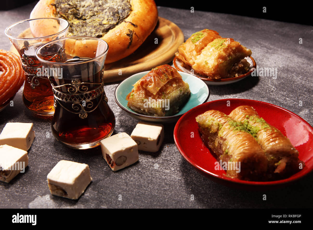 Middle eastern or arabic dishes and assorted meze, concrete rustic ...