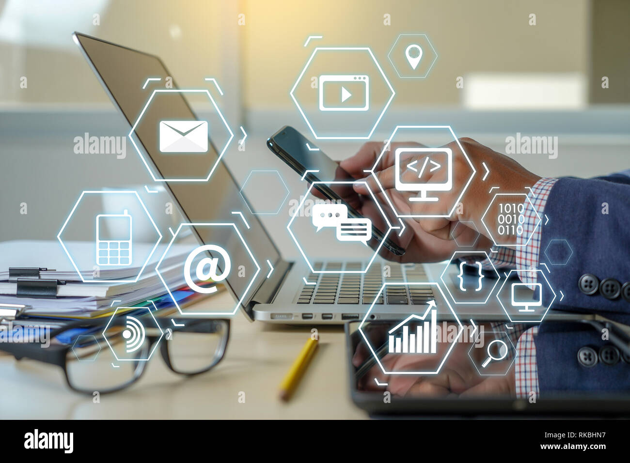 Man using tablet computer virtual interface graphic icons network ...