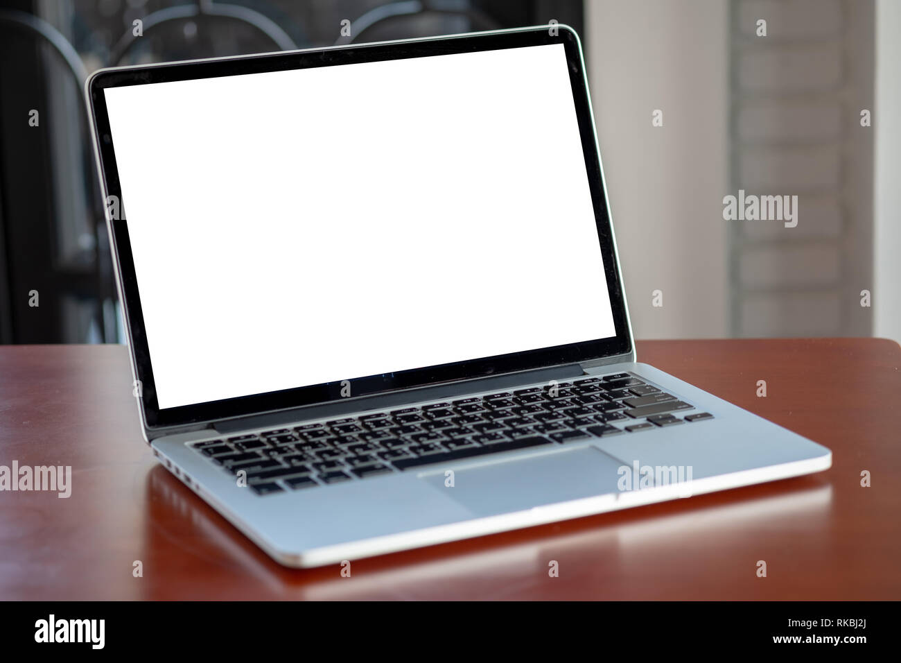 mock up Using laptop with blank screen computer modern Stock Photo - Alamy