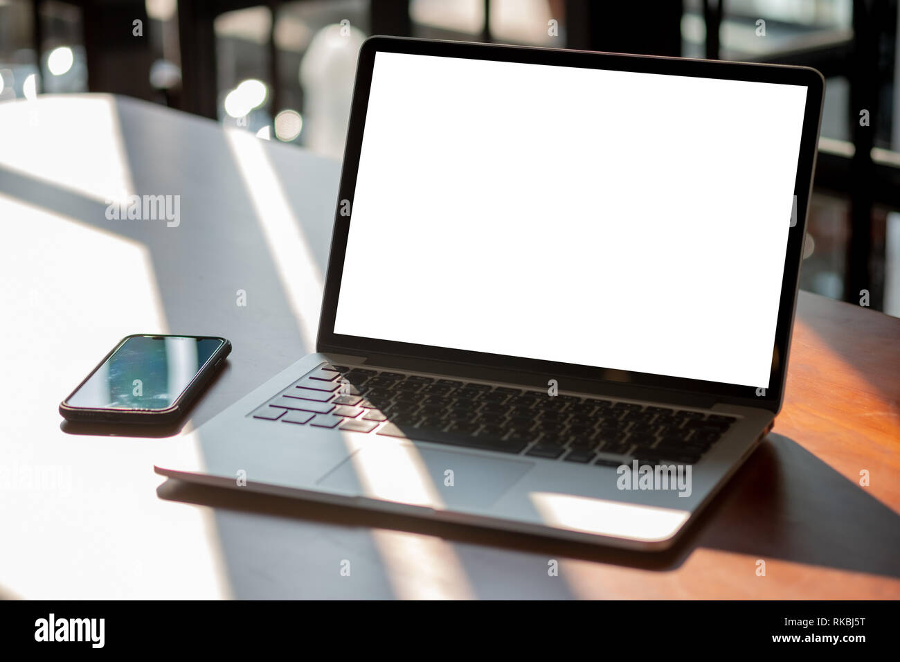 mock up Using laptop with blank screen computer modern Stock Photo - Alamy