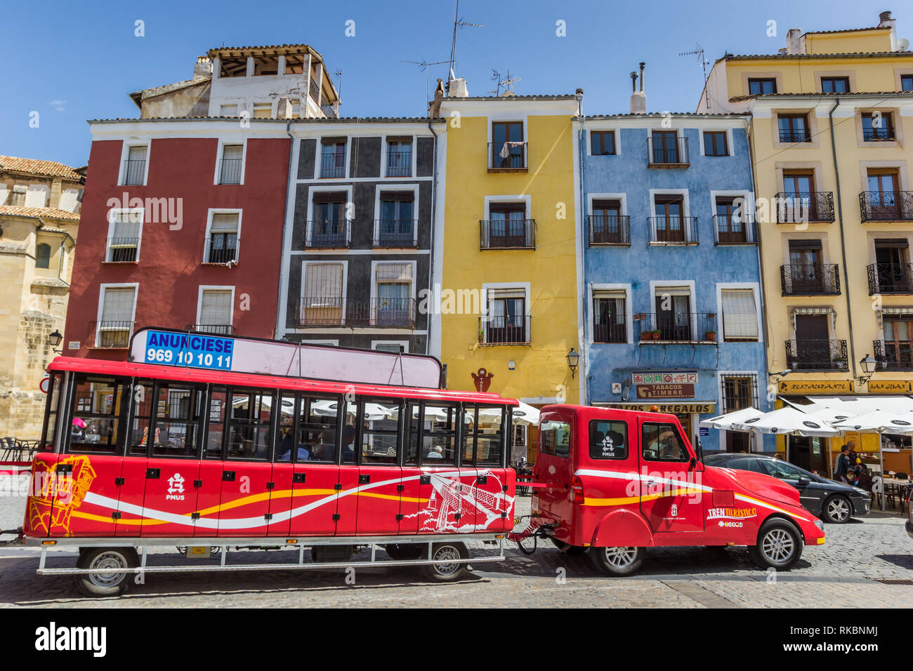 Tourist train going through the historic center of Cuenca, Spain Stock ...