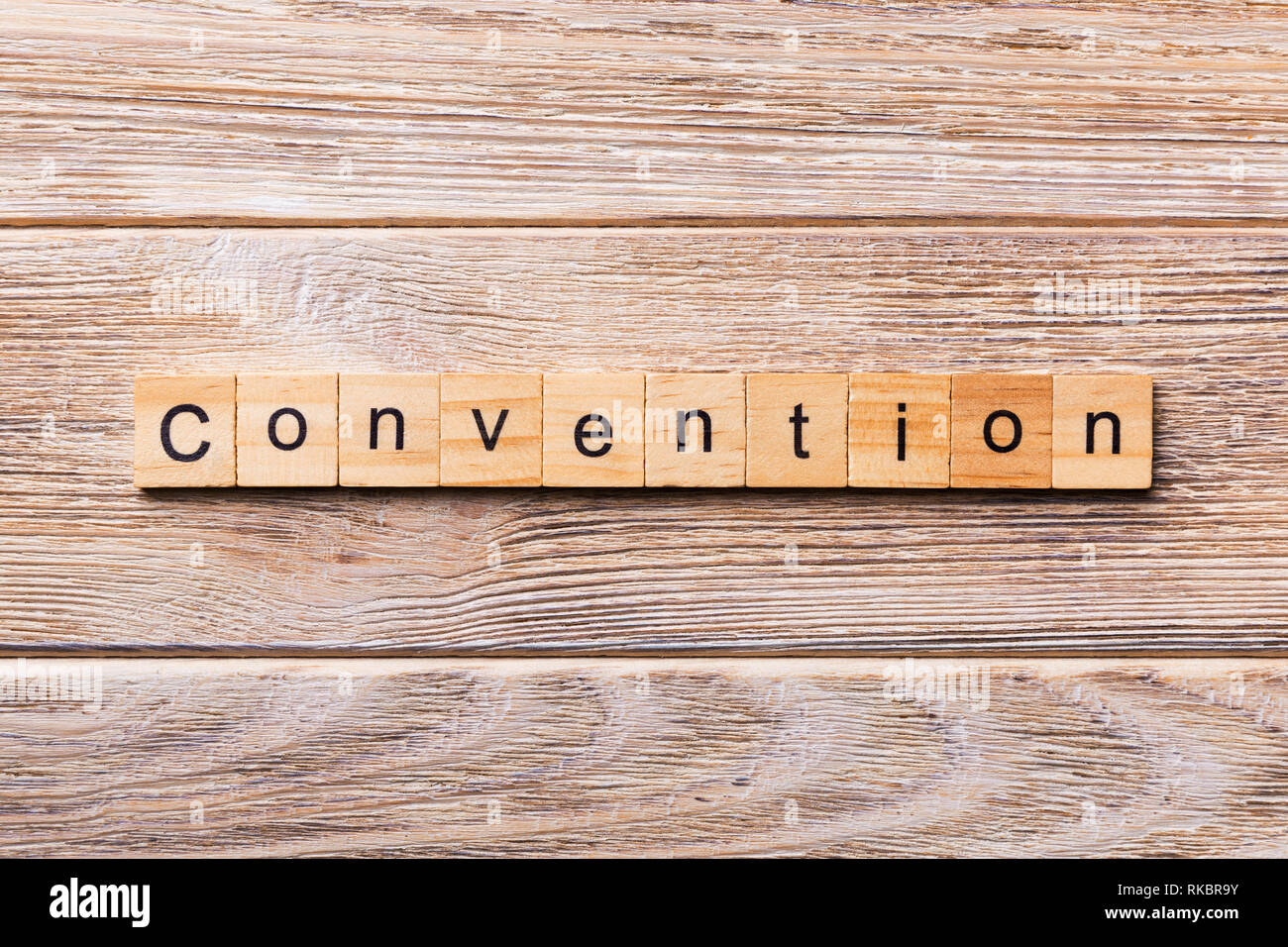 convention word written on wood block. convention text on wooden table ...