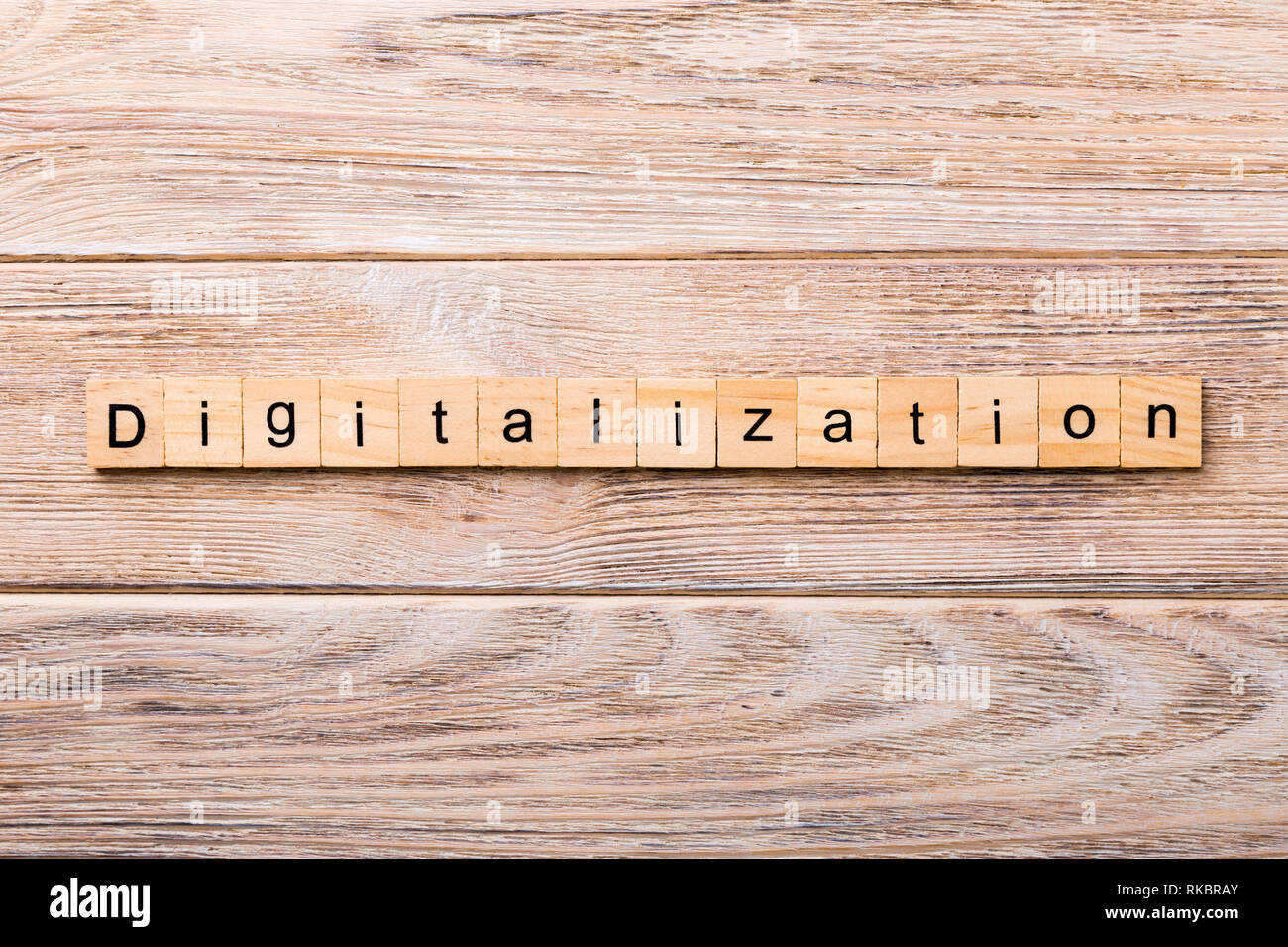 digitalization word written on wood block. digitalization text on ...