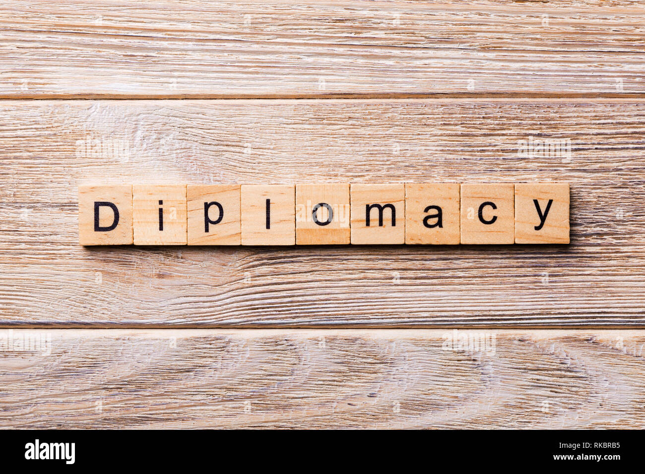 diplomacy word written on wood block. diplomacy text on wooden table ...