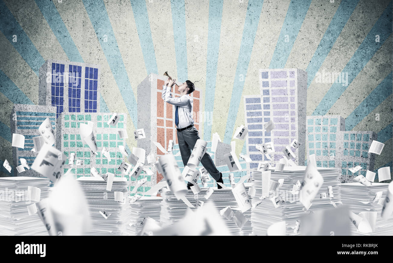 Happy businessman playing fife Stock Photo - Alamy