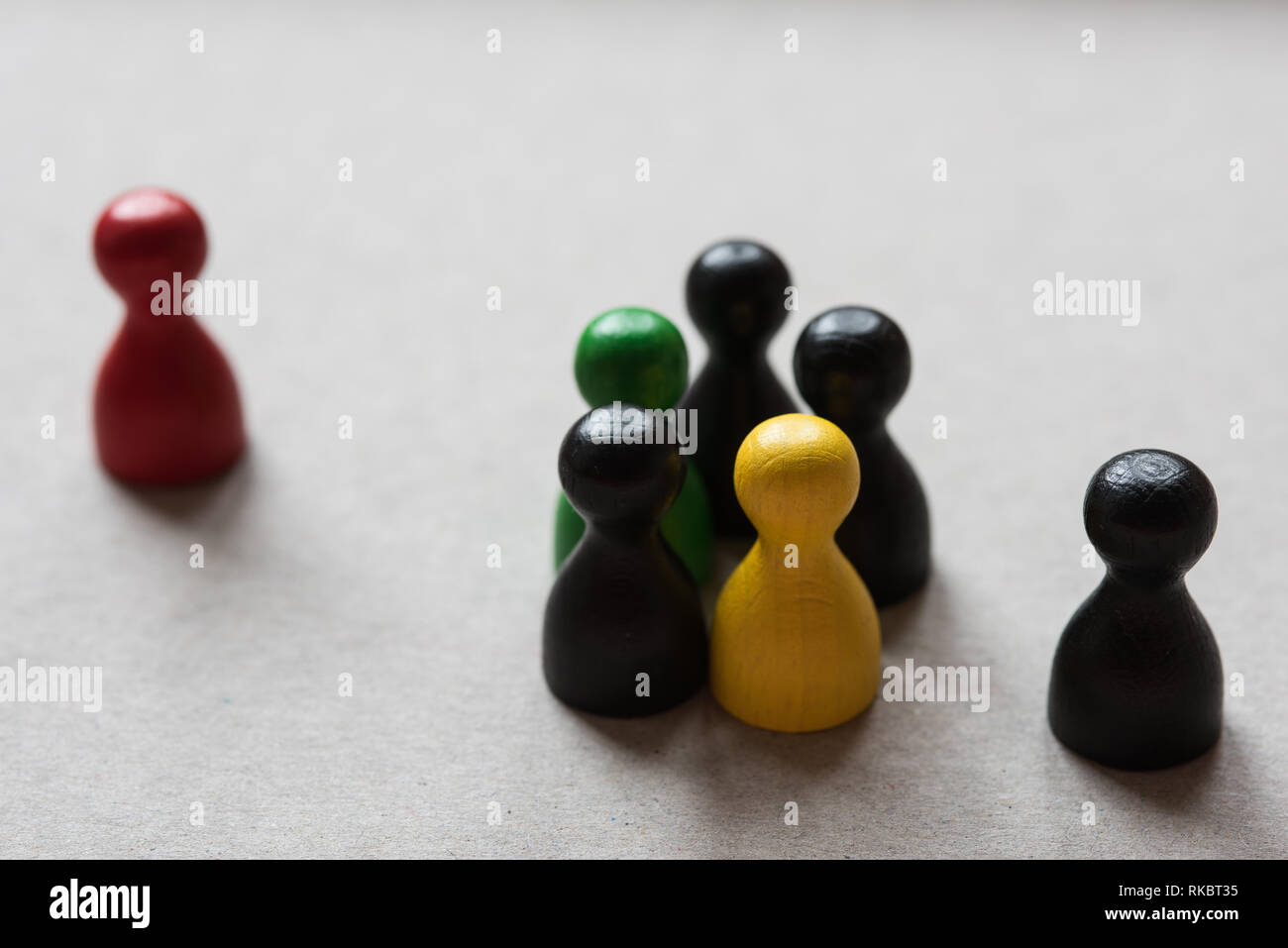 Wooden figures in different colors Stock Photo - Alamy