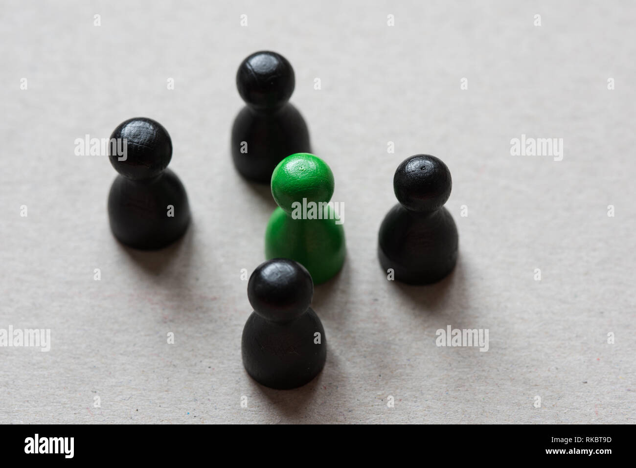 Wooden figures in different colors Stock Photo - Alamy