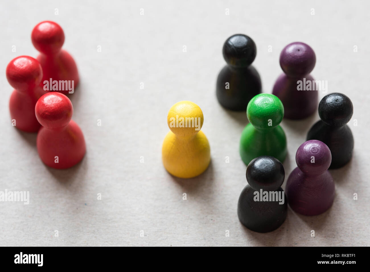 Wooden figures in different colors Stock Photo - Alamy