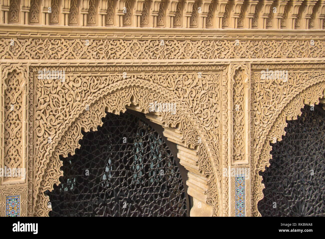 Islamic calligraphy and colorful geometric patterns a Morocco Stock ...