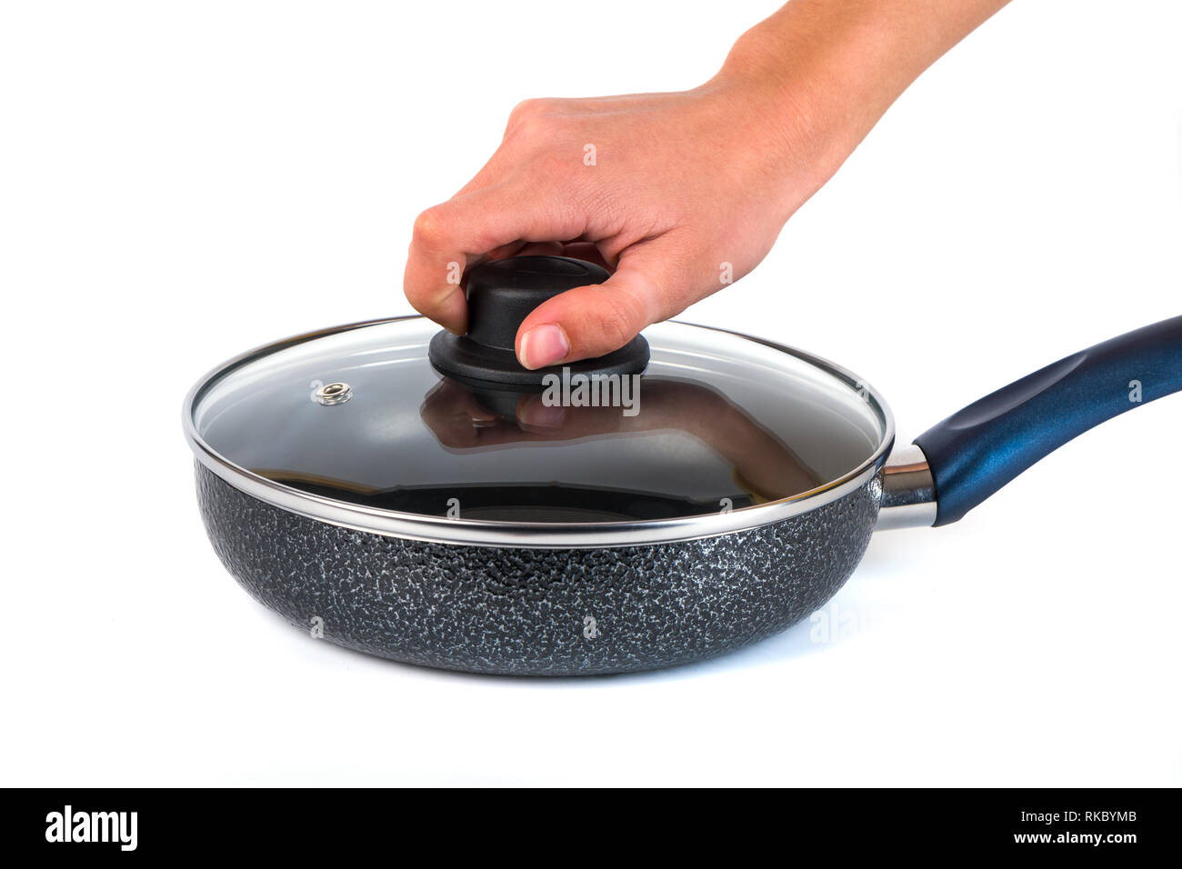 New Frying pan isolated in hand on white background Stock Photo - Alamy