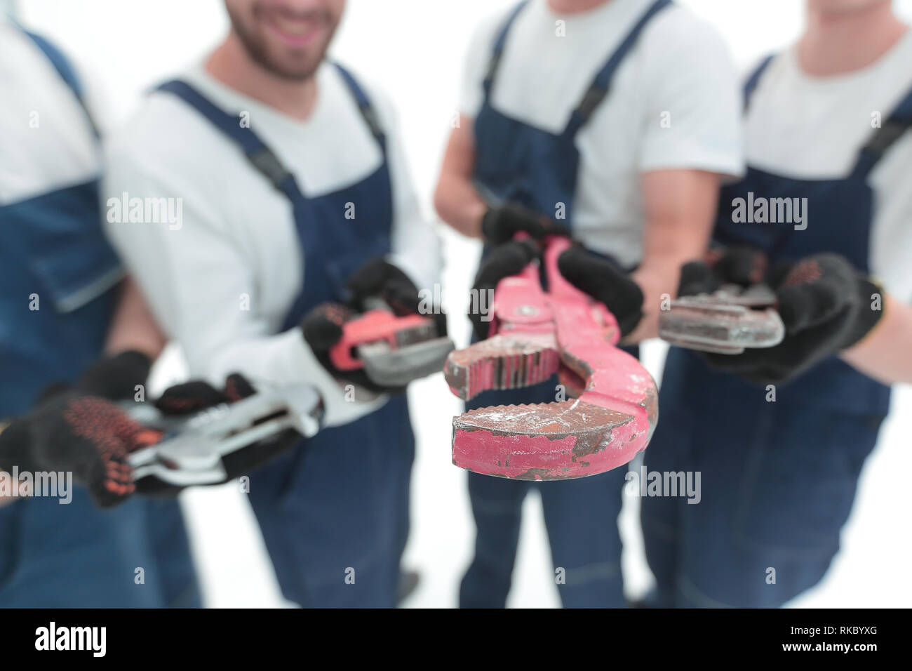 closeup.gas keys in the hands of the builders .isolated on white Stock ...