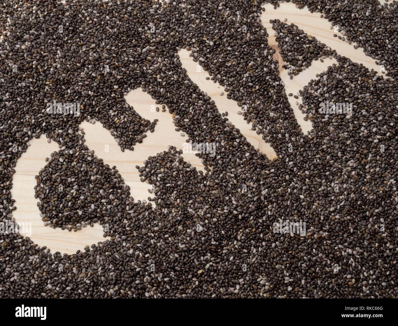 Chia seeds. Chia word made from chia seeds Stock Photo - Alamy