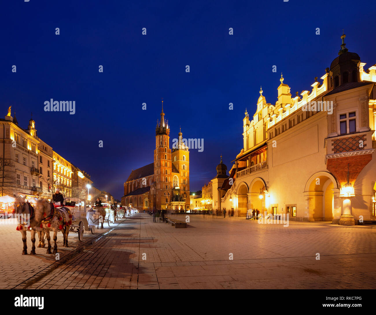 Krakow, View of the old town after sunset Stock Photo - Alamy