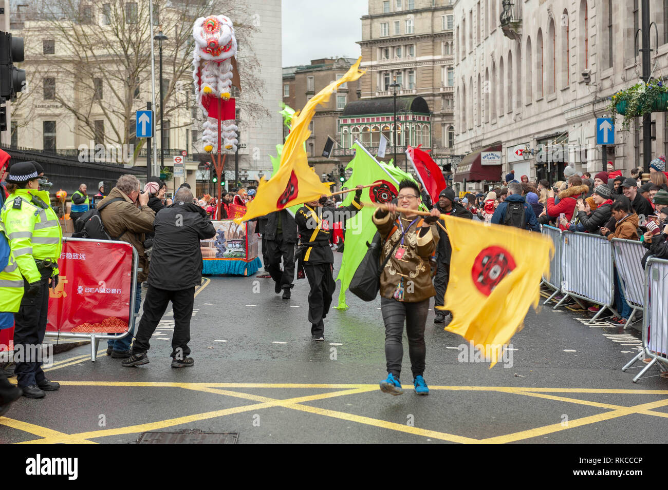 London, UK. 10th Feb, 2019. Celebratory parade approaches Trafalgar ...