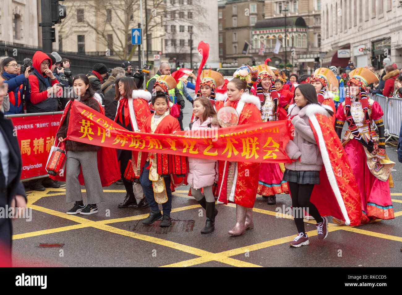 London, UK. 10th Feb, 2019. Celebratory parade approaches Trafalgar ...
