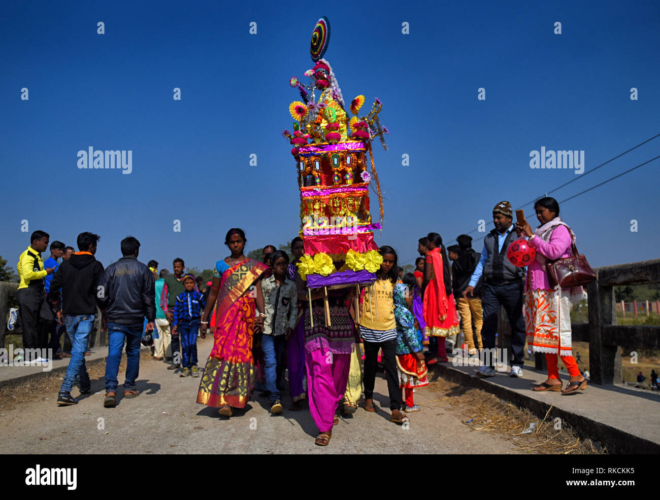 A young lady seen carrying the Chowdal during the festival. People from ...