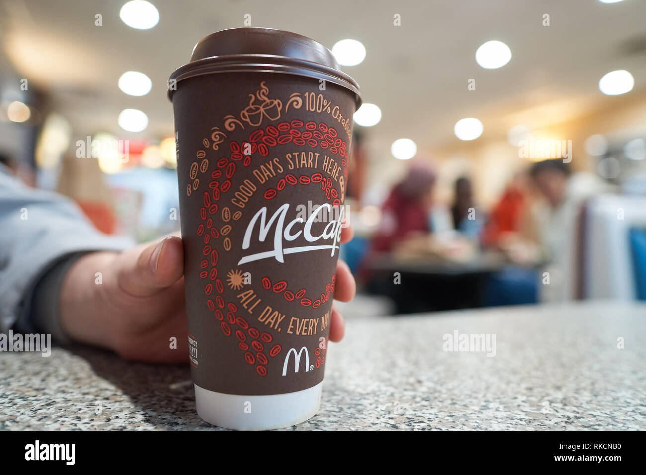 NEW YORK - CIRCA MARCH, 2016: close up shot of cup with McCafe logo ...
